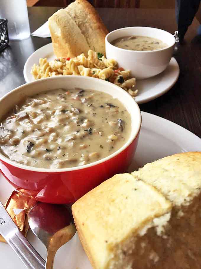 This isn't just soup—it's liquid comfort in a red bowl. Paired with fresh bread and pasta salad, it's the kind of meal that makes Alaska's nine-month winter seem almost reasonable.