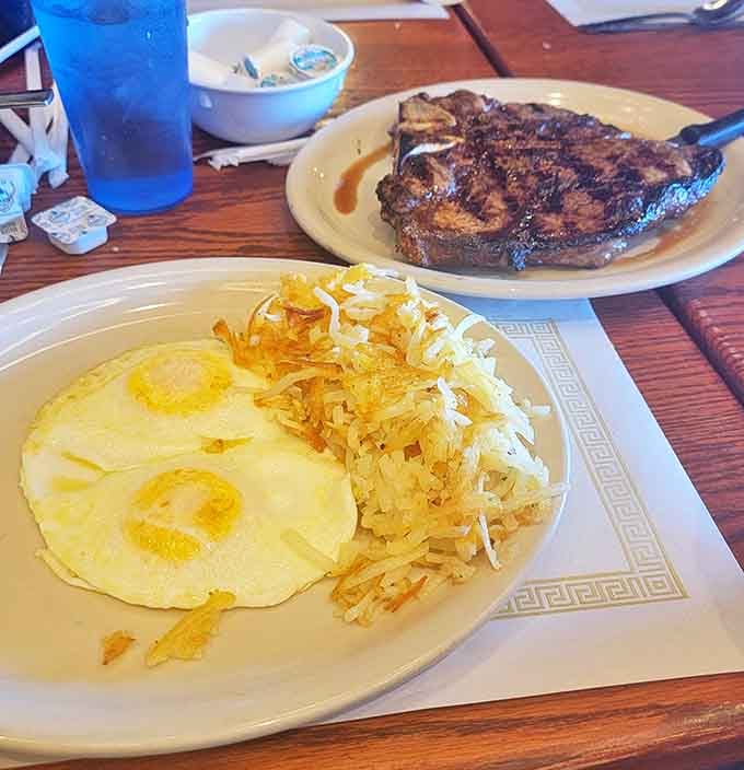 The classic power couple: perfectly cooked eggs alongside a steak that didn't just visit the grill &ndash; it formed a meaningful relationship with it.