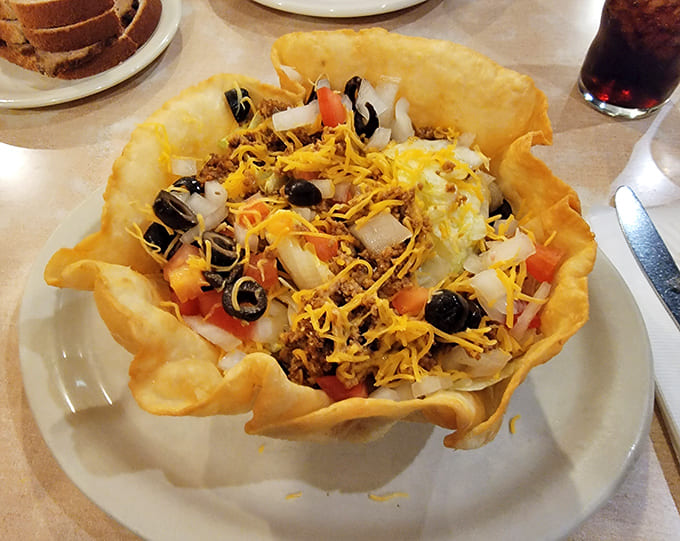 Not just a taco salad &ndash; it's an edible bowl of joy. The crispy shell cradles a fiesta of ingredients that somehow makes vegetables seem like a celebration.