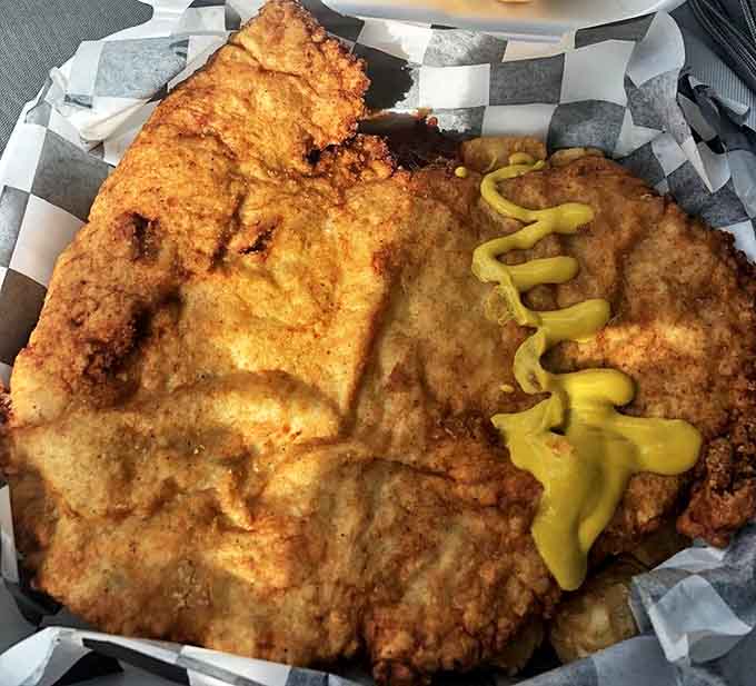 The tenderloin that ate Cedar Falls! This golden-fried masterpiece requires its own zip code and makes ordinary sandwiches look like appetizers.