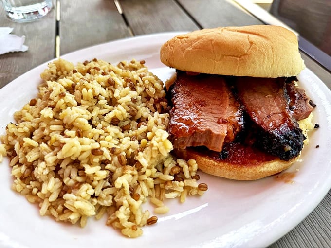 The Texas Brisket Sandwich &ndash; where smoke meets bread in perfect harmony. That side of rice and lentils provides the perfect textural counterpoint.