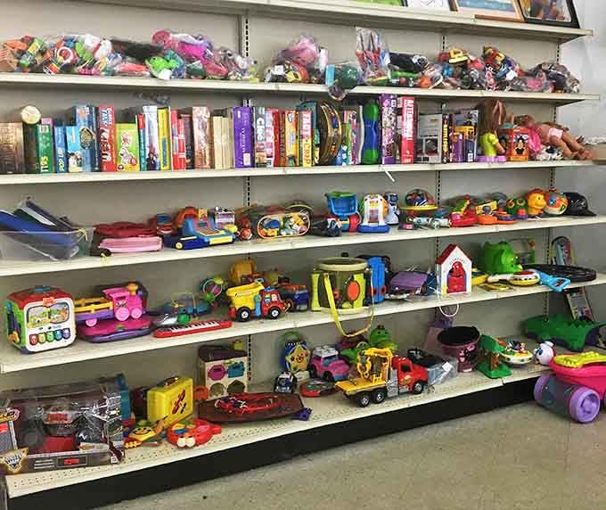 Childhood nostalgia lines these shelves, where forgotten toys await second chances with new generations of imaginative minds.