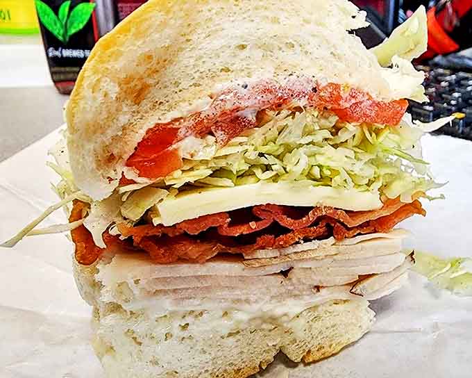 Layer upon layer of turkey, crisp bacon, and fresh veggies&mdash;this isn't just lunch, it's edible engineering at its finest.