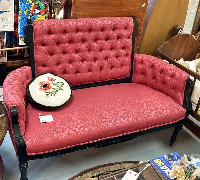 This crimson Victorian loveseat isn't just furniture&mdash;it's an invitation to sit and imagine the conversations it's witnessed over decades of Alaskan living.