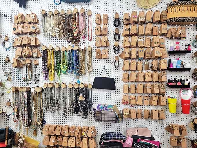 Jewelry displayed like an art installation&mdash;necklaces organized by color, earrings on cards&mdash;proof that organization is the secret sauce of superior thrifting.