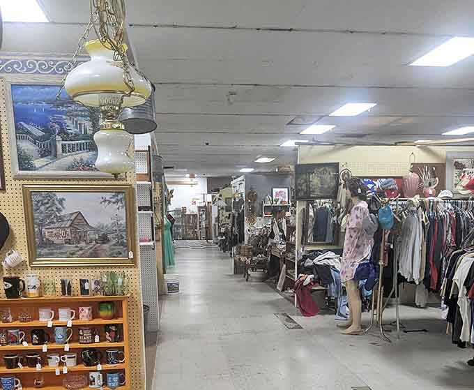 Down the rabbit hole of retail therapy past—aisles stretching into infinity with clothing, lamps, and memories for sale.