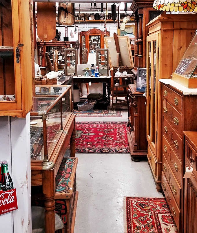 Rich oriental rugs guide you through narrow passages of polished wood cabinets, each one a doorway to someone else's memories.