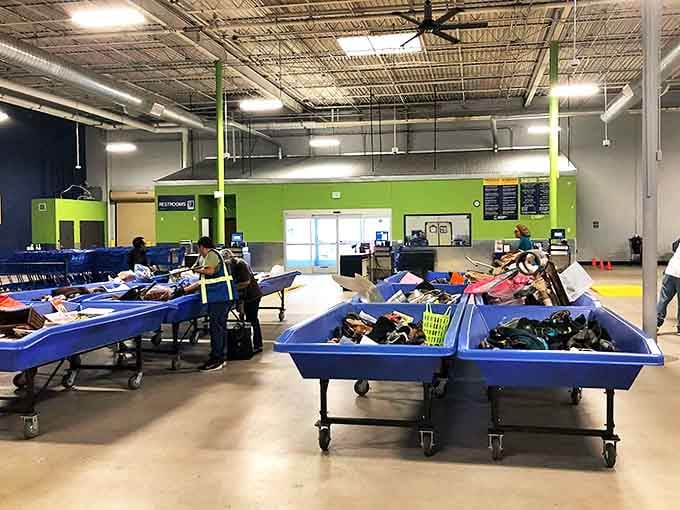 Blue bins as far as the eye can see, each one a mystery box of possibilities. What treasures lurk beneath that layer of t-shirts?