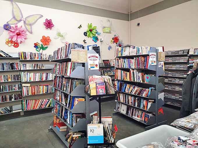 Bibliophiles, rejoice! This literary corner offers everything from dog-eared paperbacks to pristine hardcovers, all beneath whimsical butterfly decorations.