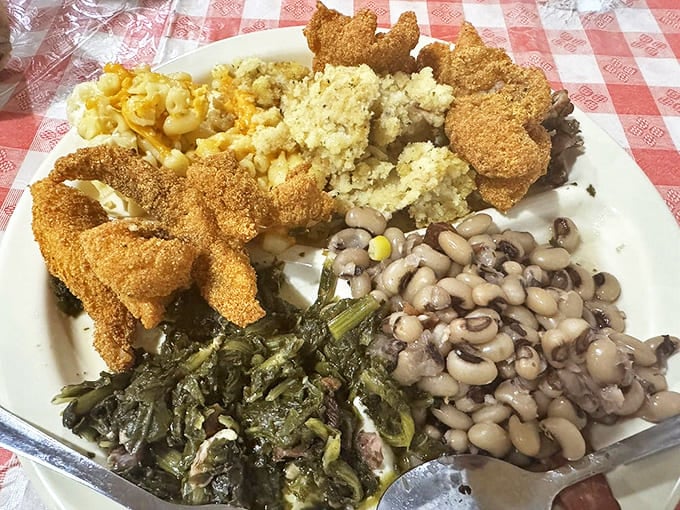 Soul food symphony in perfect harmony. Those greens have stories to tell, and the fried catfish is crispy enough to make angels sing.