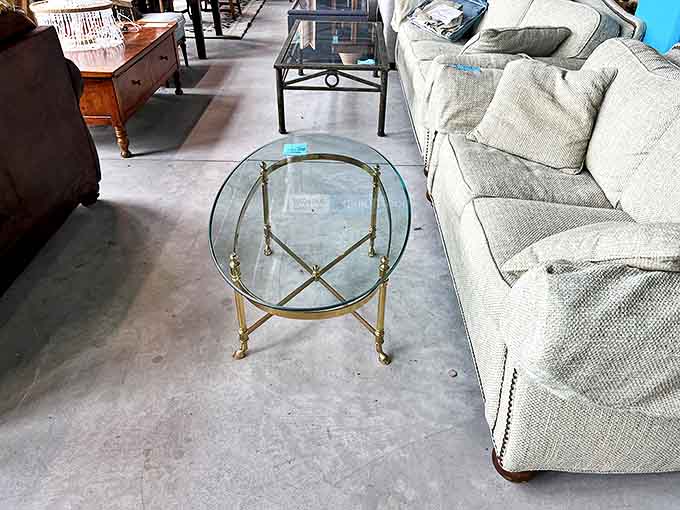 That brass and glass coffee table screams "I belonged in a 1980s soap opera mansion" &ndash; and now it could be yours!