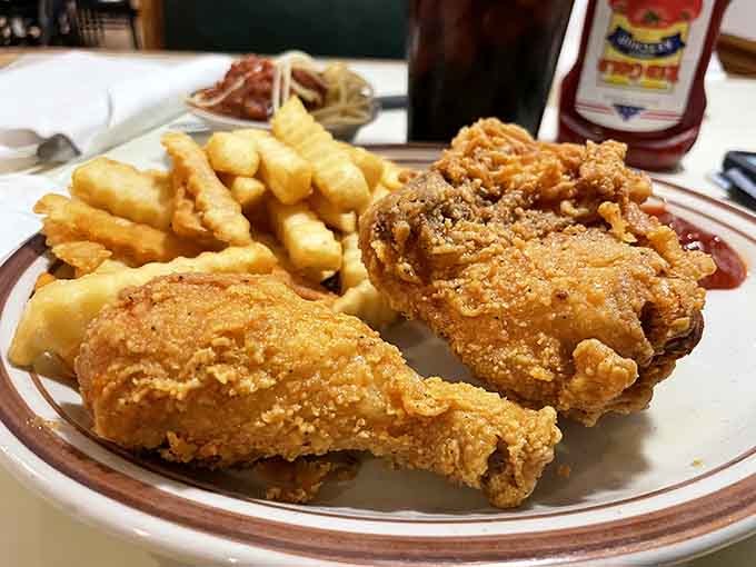 Golden-brown fried chicken that would make your grandmother both proud and jealous. The kind of crispy that makes a satisfying sound when your fork breaks through.