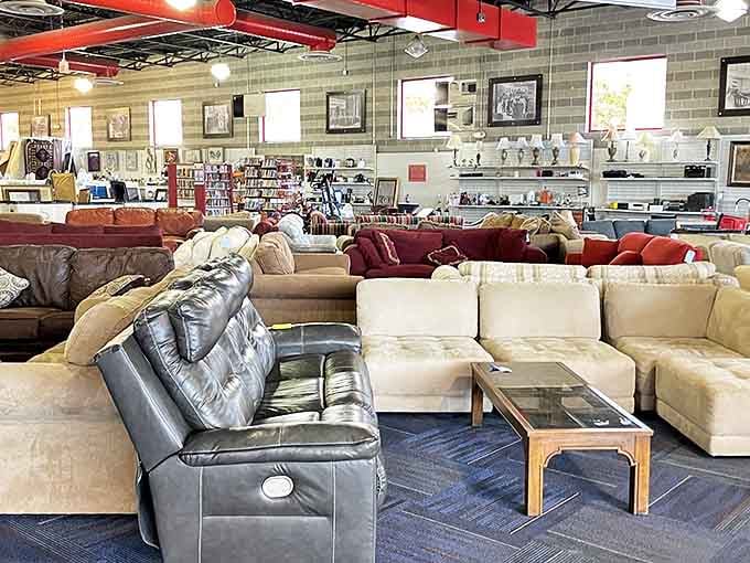 Couches and sectionals create an impromptu living room showroom. That cream-colored number could be the statement piece your den's been missing.