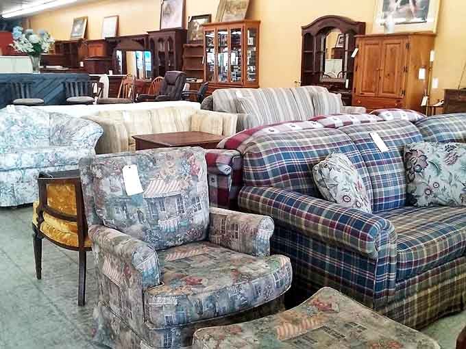 Sofa heaven awaits! Where else can you find grandma's floral armchair sitting comfortably next to a plaid couch that screams "1990s sitcom dad"?