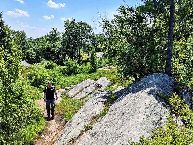 Hiking through Harriman's rocky terrain – where the path less traveled rewards you with solitude and the satisfying ache of earned views.