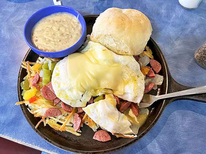 A skillet breakfast that's essentially a greatest hits album of morning favorites. That melted cheese blanket is performing acts of delicious mercy.
