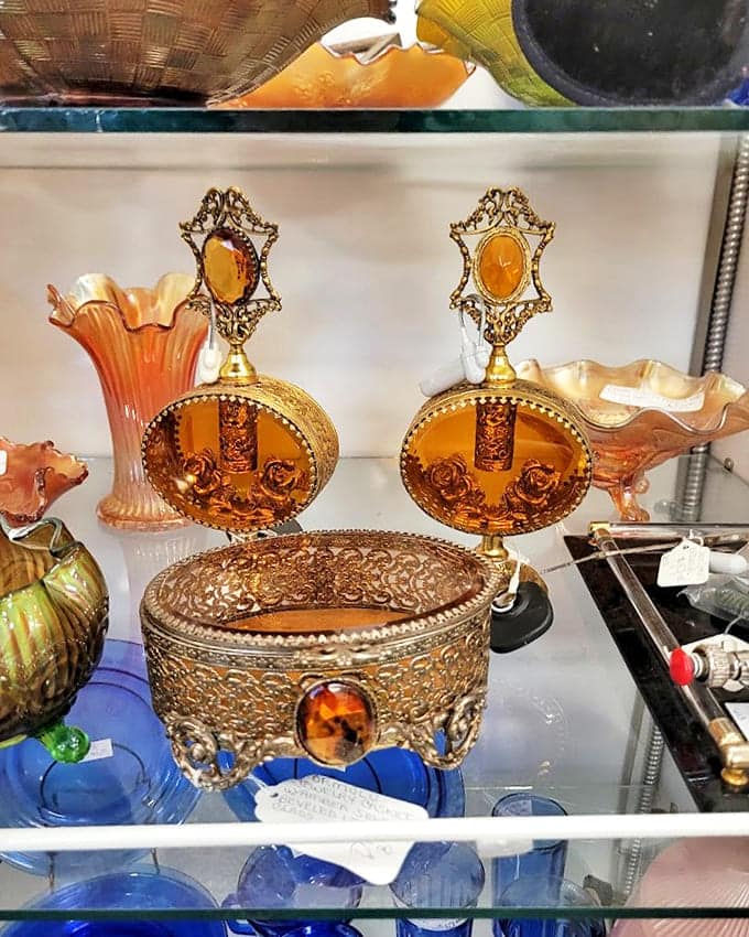 Amber glass treasures catch the light like liquid honey. Grandmother's special occasion pieces find new admirers in each generation.