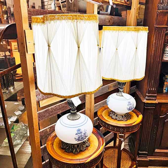 Vintage lamps with delicate porcelain bases and pleated shades&mdash;because some lighting deserves better than the harsh reality of LED bulbs.