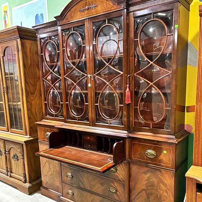 This isn't just a bookcase&mdash;it's architectural romance with those curved glass doors. Downton Abbey vibes without the aristocratic price tag.