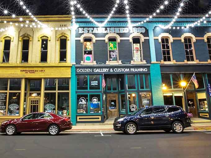 Twinkling lights transform Bay City's historic storefronts after dark. These preserved buildings now house galleries and shops where Michigan's past meets its present.