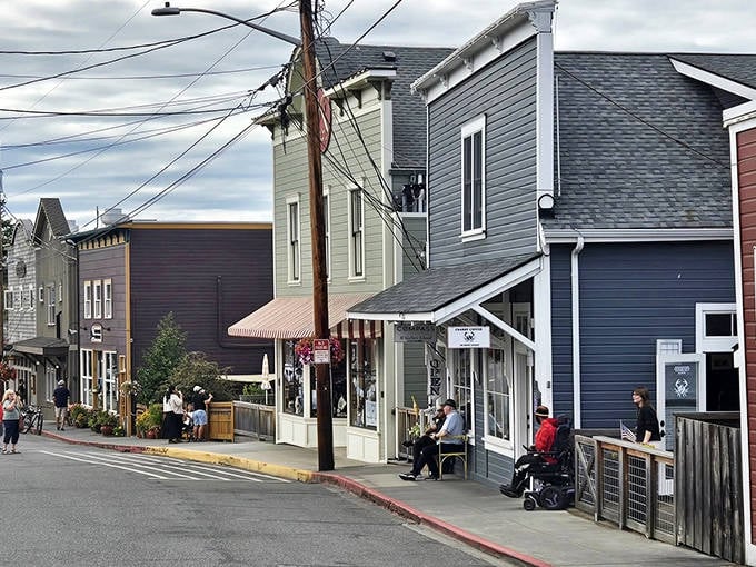 Coupeville's charming Front Street invites visitors to stroll, shop, and relax on benches while soaking up small-town vibes.