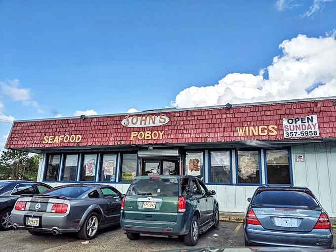 Where Baton Rouge locals line up for po'boys and platters. That faded sign has guided hungry folks for years!