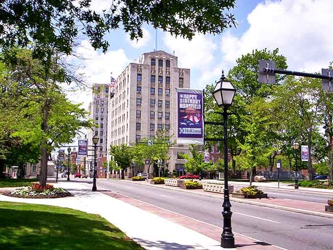 Stately buildings stand as silent sentinels in downtown Mansfield, where history and modern life blend in perfect harmony.