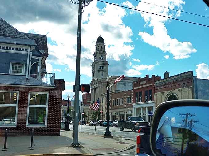 Clock tower standing sentinel over streets that have welcomed walkers for generations.