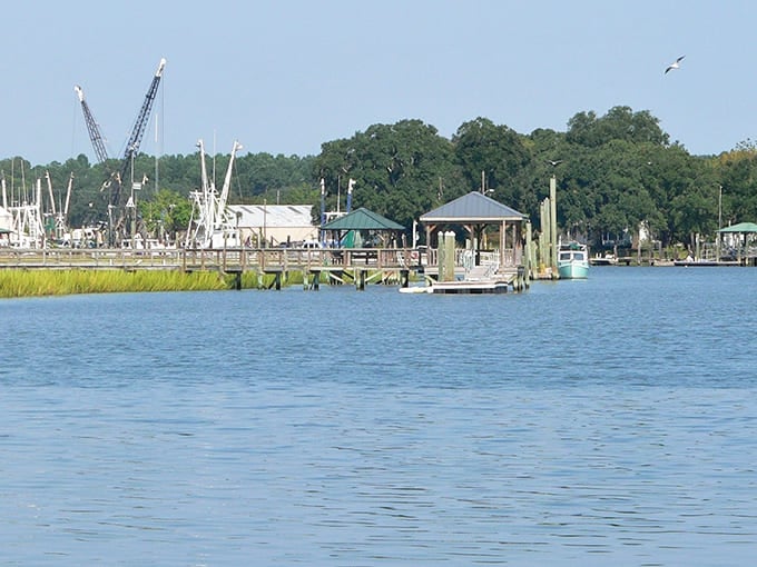 The docks of McClellanville stretch into waters where shrimp boats have launched before dawn for more decades than anyone can count.