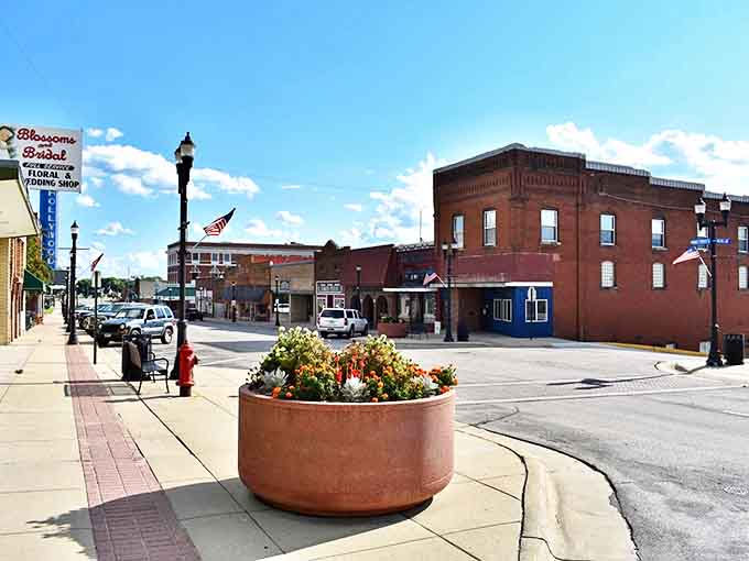 The distinctive red balconies of Montevideo's historic buildings add a splash of color against the brilliant Minnesota blue sky.