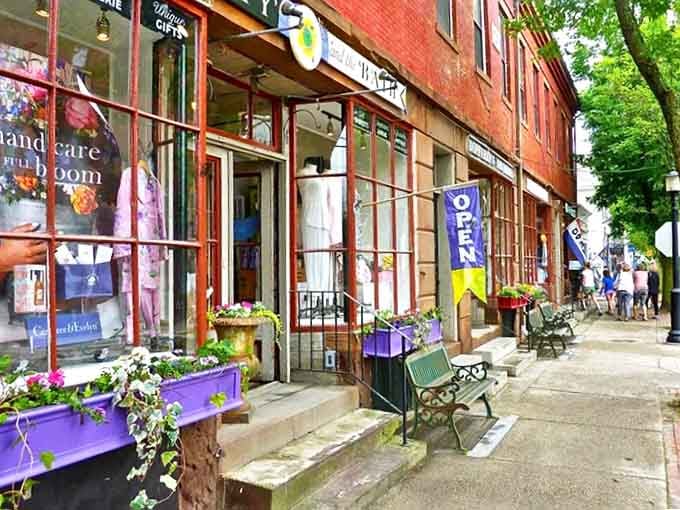 Wickford's revitalized downtown features colorful storefronts with flower boxes, where local shops welcome neighbors for unhurried browsing and friendly conversation.