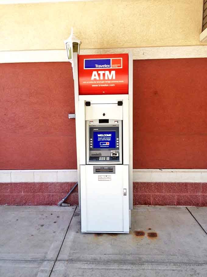 The lonely ATM stands ready for shopping emergencies, like a first responder for retail therapy crises. It's seen things&mdash;mostly the tears of shoppers checking their balances.