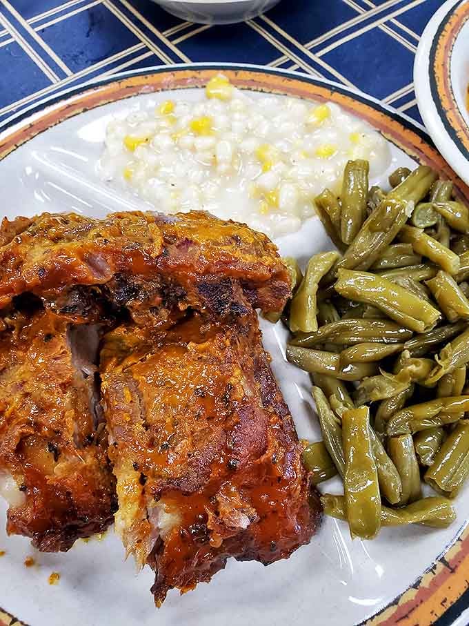BBQ ribs that don't need fancy plating because they're too busy delivering that perfect smoke ring and fall-off-the-bone tenderness.