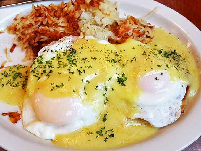 Eggs Benedict with hollandaise so yellow it could brighten a North Dakota winter day. Comfort food wearing its Sunday best.