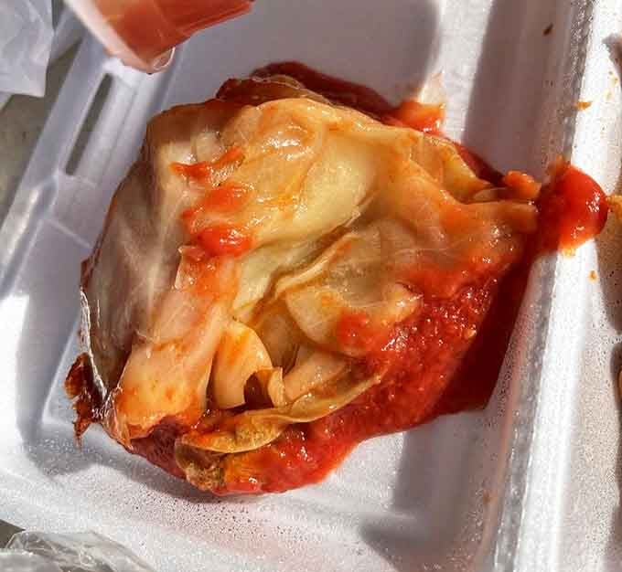 These cabbage rolls aren't just food; they're time machines wrapped in leaves, simmered in tomato sauce that tastes like someone's grandmother spent all day in the kitchen.