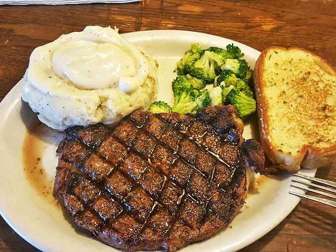 This perfectly grilled steak with its crosshatch grill marks is like edible artwork &ndash; paired with cloud-like mashed potatoes and vibrant broccoli for balance.
