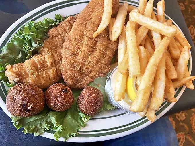 Crispy catfish that would make any angler jealous, served with hushpuppies that somehow manage to be both airy and substantial.