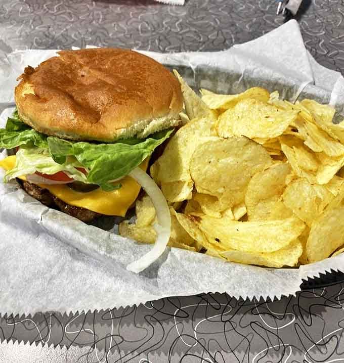 The classic American cheeseburger&mdash;where lettuce, tomato, and onion aren't just toppings, they're supporting actors in a delicious drama starring beef.