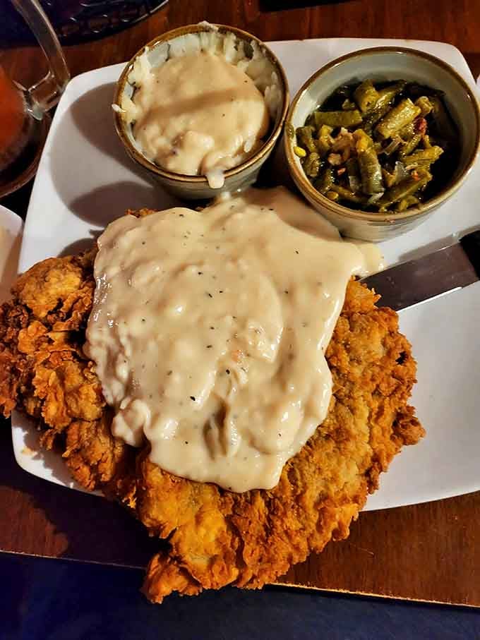 Country-fried steak smothered in gravy that your grandmother would approve of, with sides that make you question why vegetables ever got a bad rap.