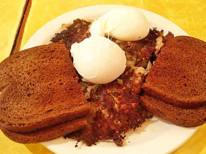 Corned beef hash crowned with poached eggs&mdash;the breakfast equivalent of hitting the lottery before your second cup of coffee.