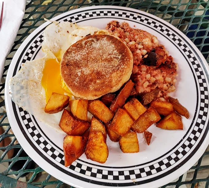 Breakfast with attitude&mdash;a perfectly cooked egg, home fries with purpose, and an English muffin standing by for cleanup duty.