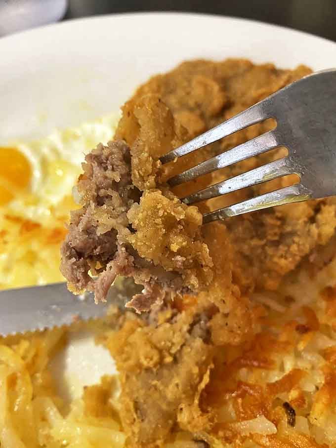 Country fried steak that's traveled through time from your grandmother's kitchen &ndash; crispy, tender, and unapologetically comforting with every bite.