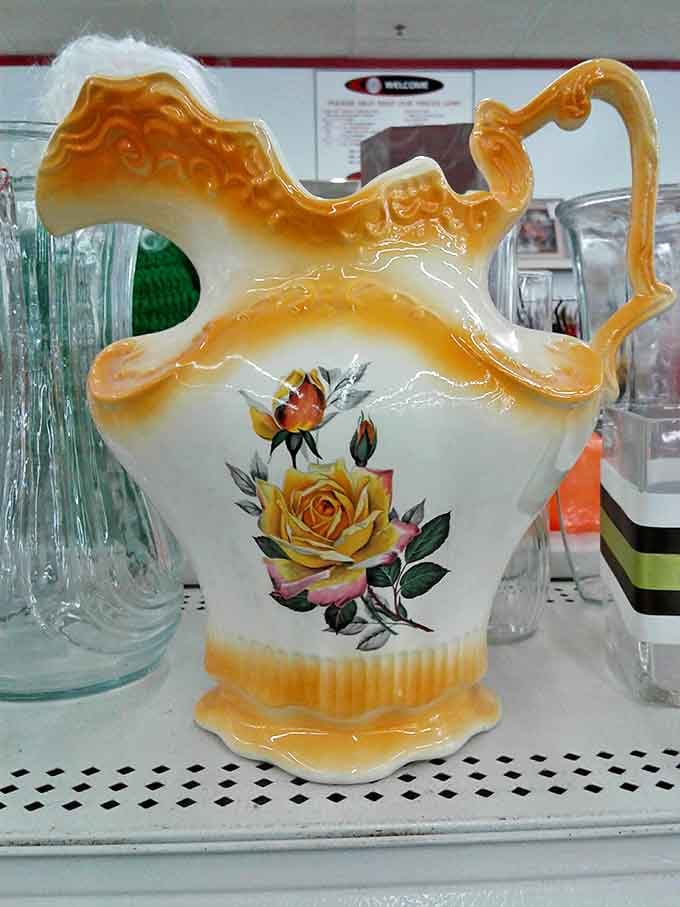 Grandma's china cabinet called—it's missing this gloriously kitschy rose-adorned pitcher that screams "Sunday best" from another era.