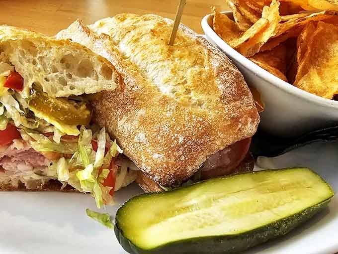 This sandwich doesn't just satisfy hunger&mdash;it conquers it. Layers of goodness nestled between perfectly toasted bread, with house-made chips standing guard.