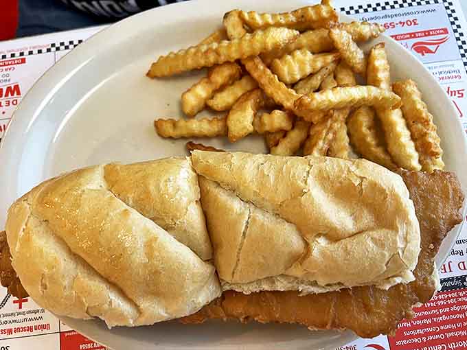 The fish sandwich that launched a thousand return visits, with fries so perfectly golden they deserve their own Instagram account.