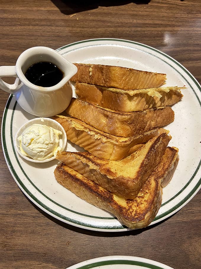French toast so perfectly golden it makes you wonder if King Midas has been moonlighting in the kitchen.