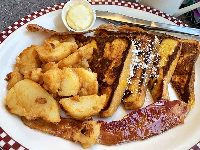 French toast that makes you question every other breakfast you've ever had. That bacon strip isn't a side&mdash;it's an exclamation point.