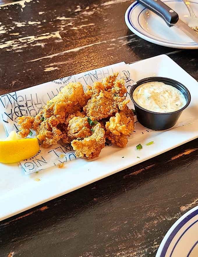 Golden-fried oysters with just the right crunch-to-brine ratio, served with a dipping sauce that deserves its own fan club.