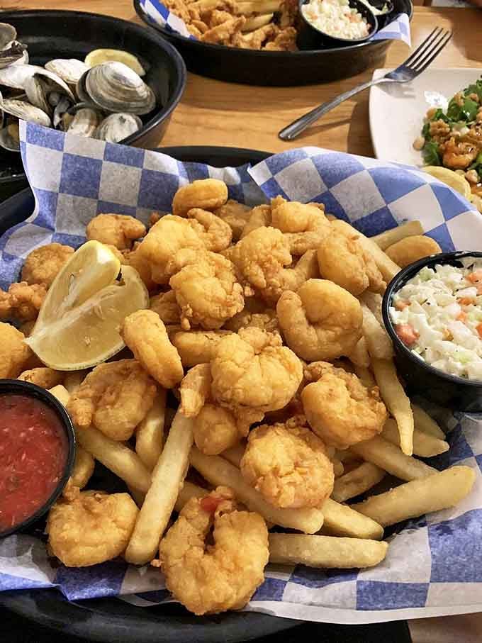 Fried shrimp and fries&mdash;the dynamic duo of seafood dining. Simple perfection that needs no explanation, just appreciation.