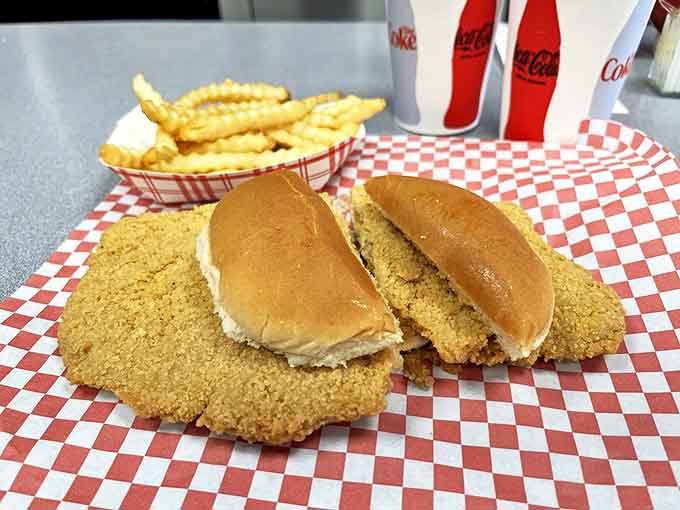 The tenderloin that launched a thousand road trips. When your sandwich requires its own zip code, you know you're in Iowa.